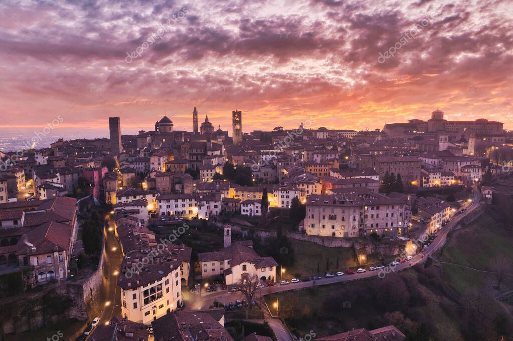 High point of view at buildings in Bergamo Alta during dusk, Lombardy ...