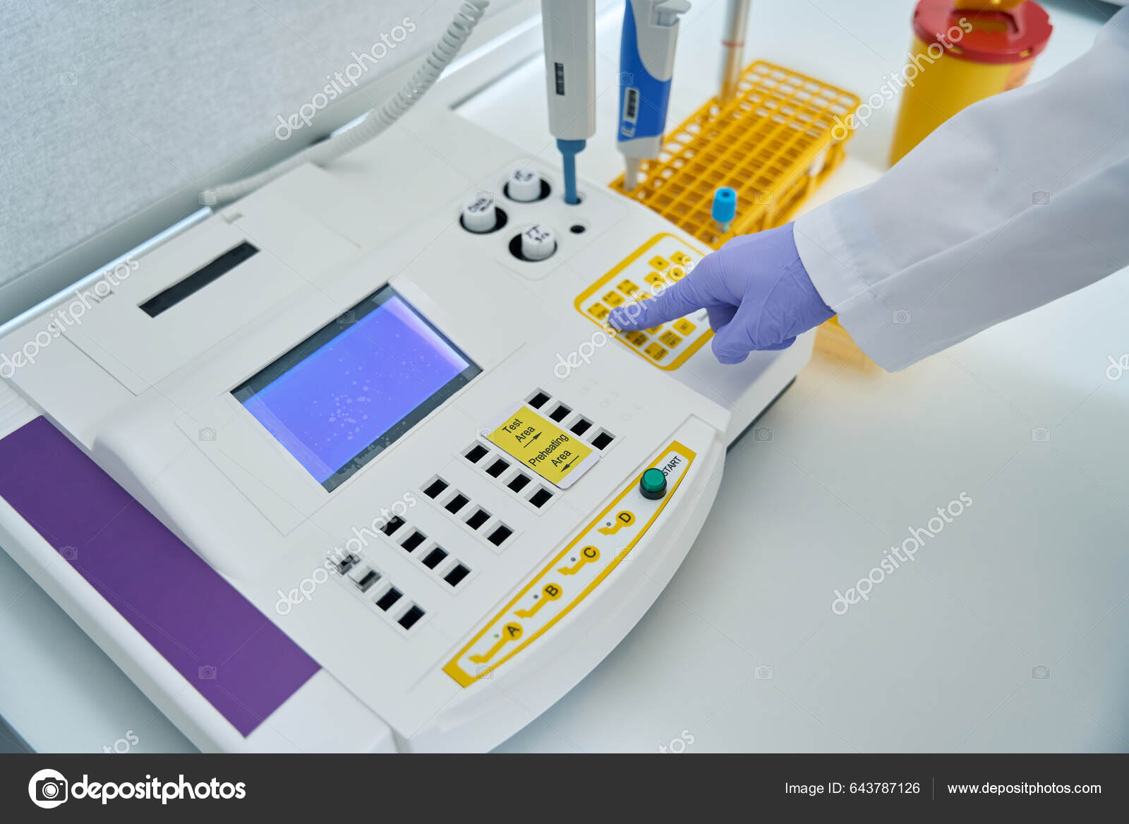 Employee Diagnostic Laboratory Presses Button Coagulometer Device ... Employee Diagnostic Laboratory Presses Button Coagulometer Device ...