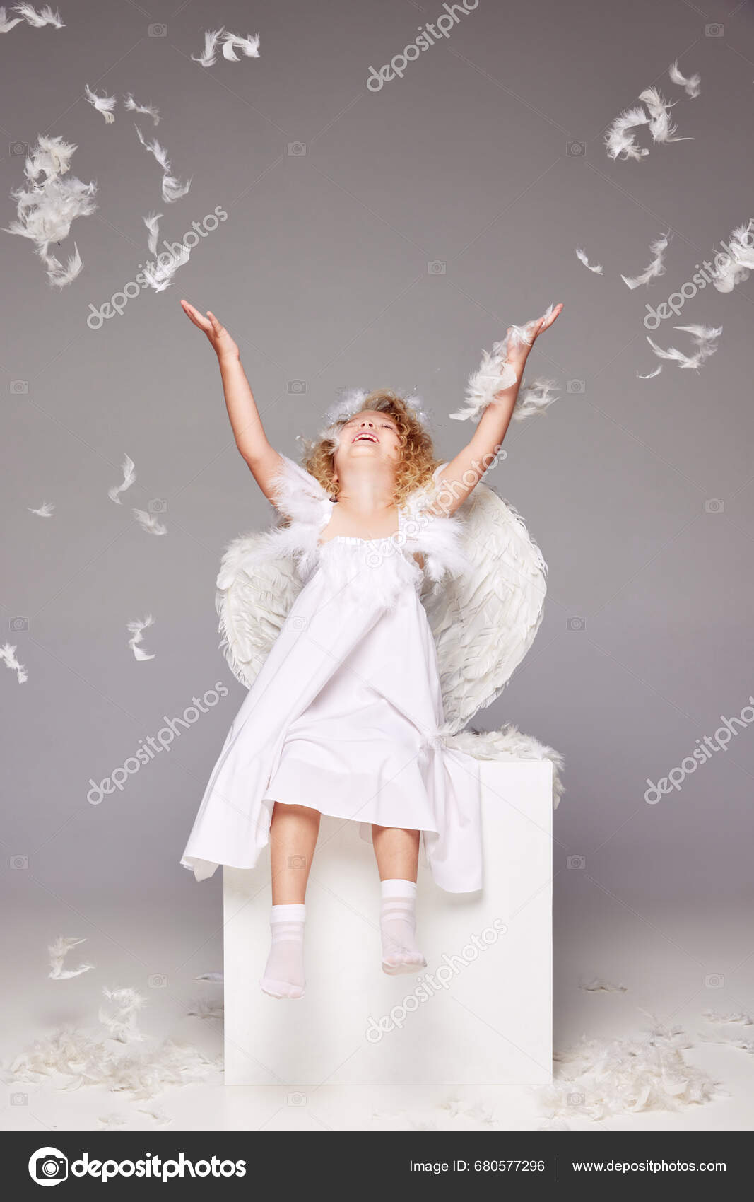 Happy Smiling Positive Little Girl Child Costume Angel Sitting Isolated ...