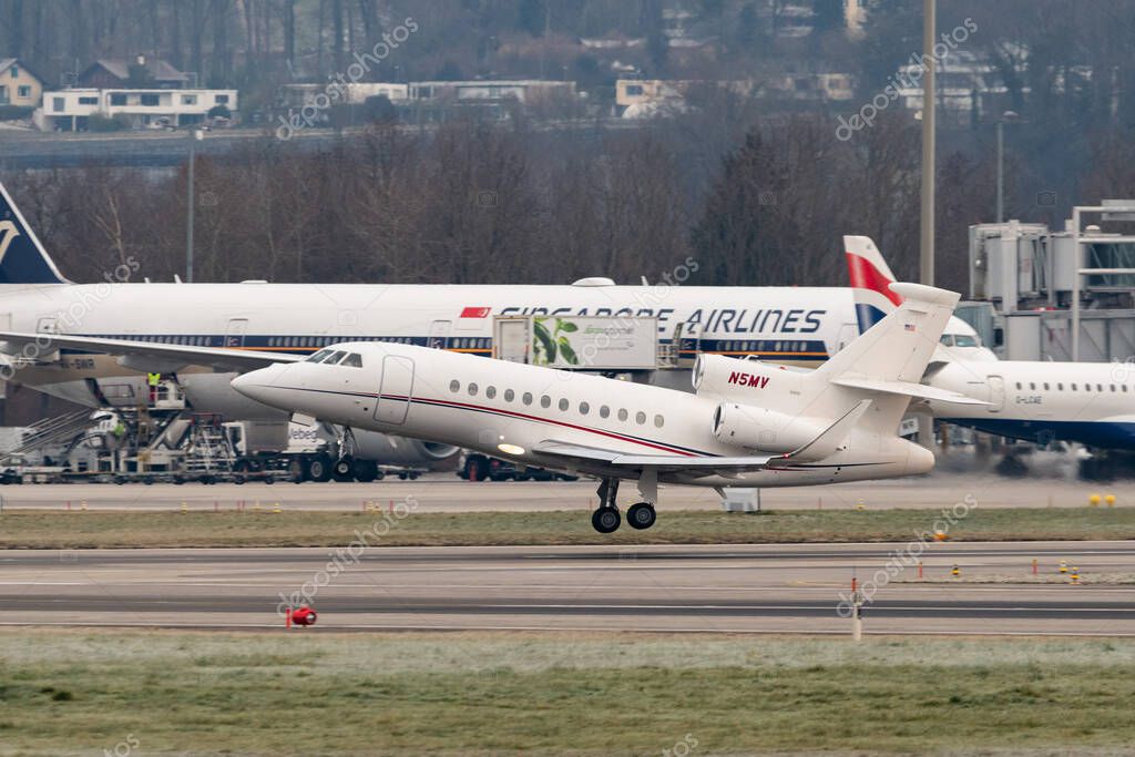 Zurich, Switzerland, January 20, 2023 Dessault Falcon 900EX business aircraft departing from ...