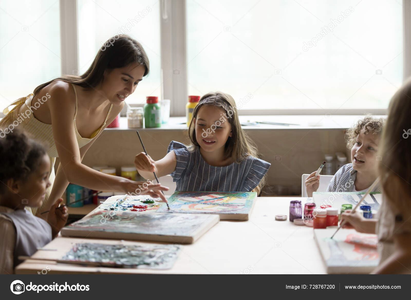 Group Little Multiethnic Boys Girls Sit Table Painting Canvas Attend — Stock Photo © fizkes ...