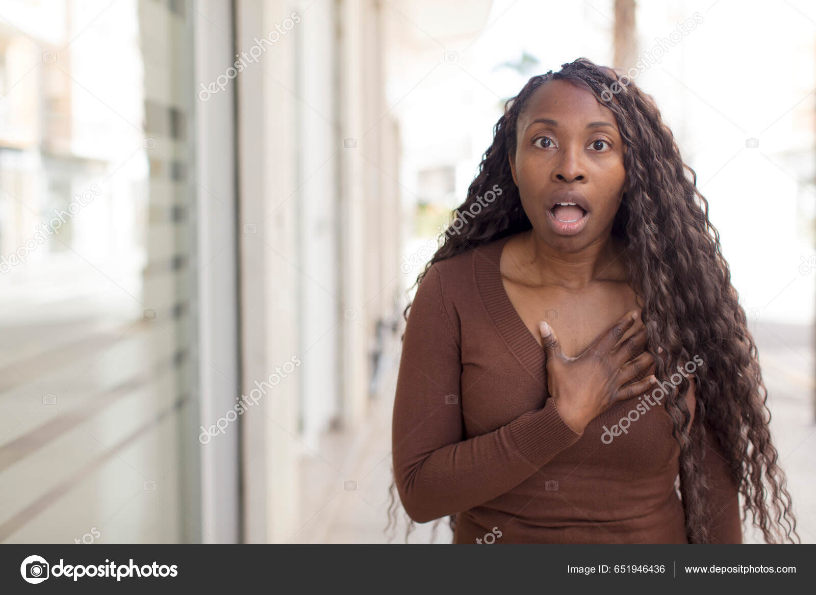 Afro Pretty Black Woman Feeling Shocked Astonished Surprised Hand Chest Stock Photo kues 651946436