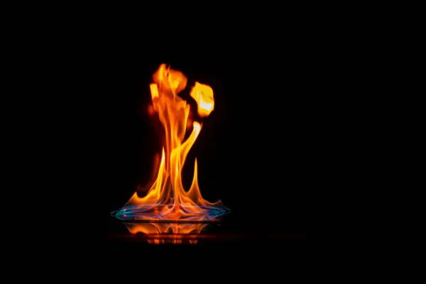 Fire flame blowing sideways Stock Photos, Royalty Free Fire flame ...