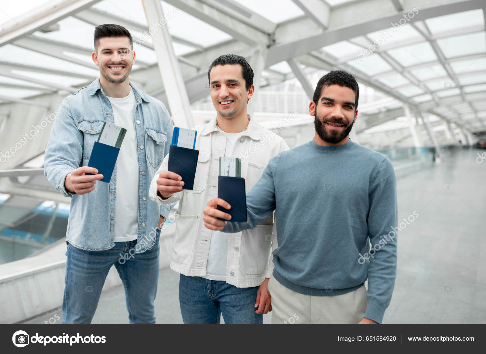 Group Three Smiling Males Showing Boarding Passes Passports Looking ...