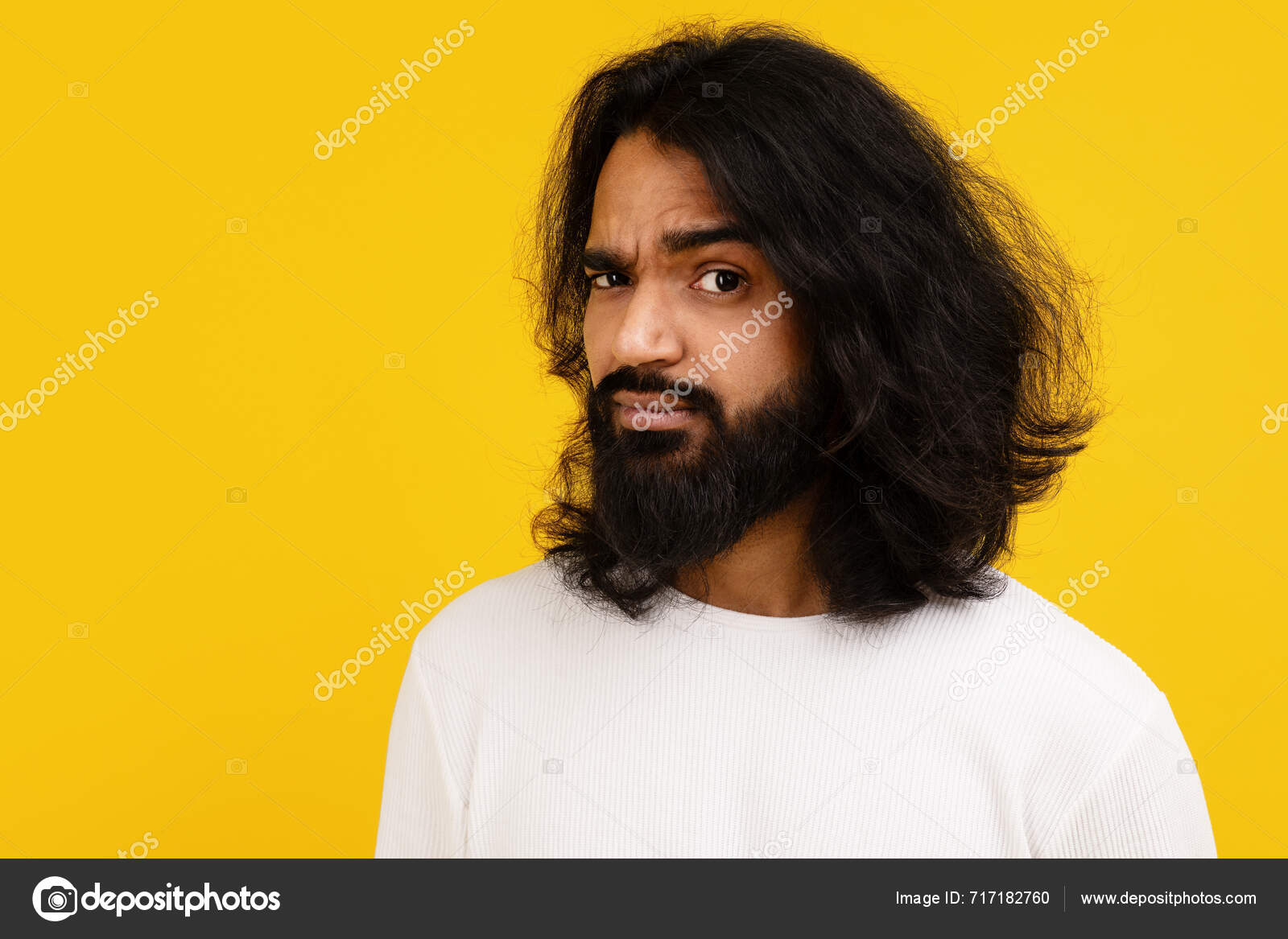 Perplexed Young Indian Man Furrowed Brow Stands Vivid Yellow Backdrop ...