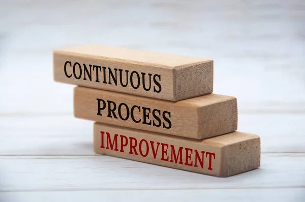 Continuous Process Improvement Text White Wooden Blocks Continuous ... Continuous Process Improvement Text White Wooden Blocks Continuous ...