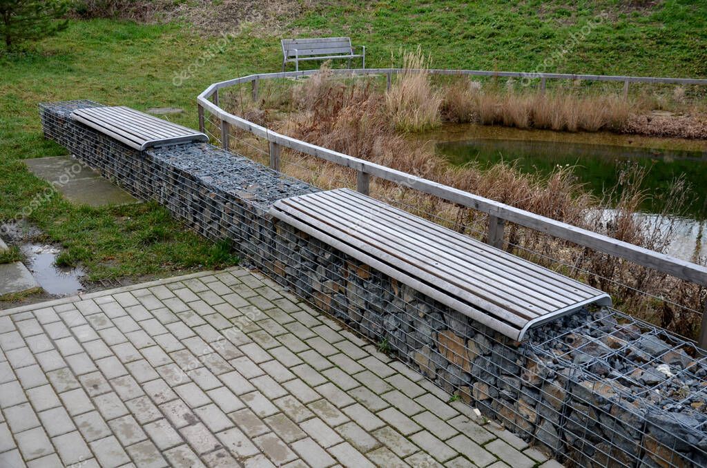 swimming lake landscaped coastal zone of shallow water and a deeper ...