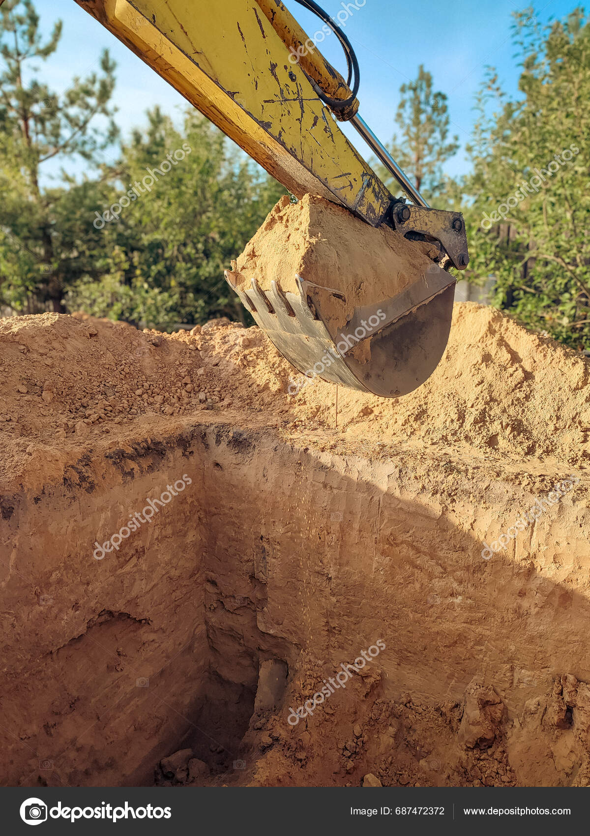 Excavator Digs Foundations Building Digging Pit Foundation Hole ... Excavator Digs Foundations Building Digging Pit Foundation Hole ...