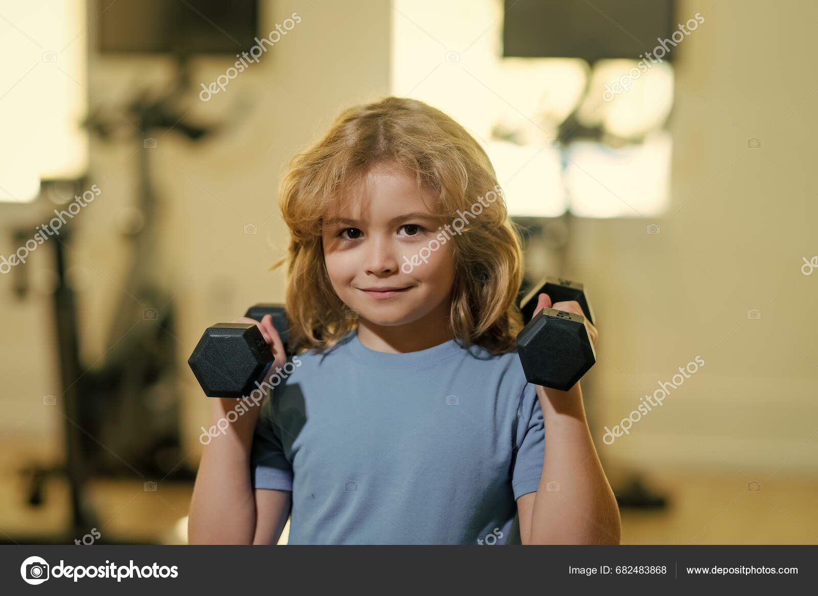 Child Boy Pumping Biceps Muscles Dumbbell Child Workout Kid Gym Stock ...