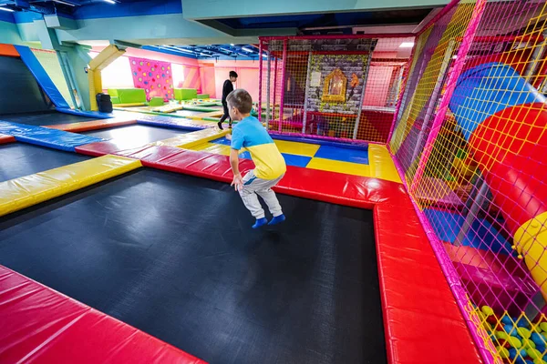 Kids jumping center Stock Photos, Royalty Free Kids jumping center ...