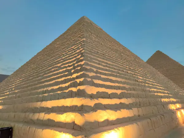 Riyadh,Saudi Arabia-Dec 25, 2025:Spotlights illuminate replica pyramids ...