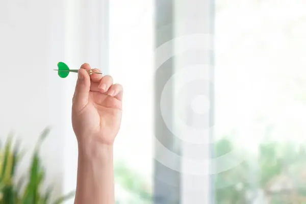 Hand holding dart Stock Photos, Royalty Free Hand holding dart Images ...