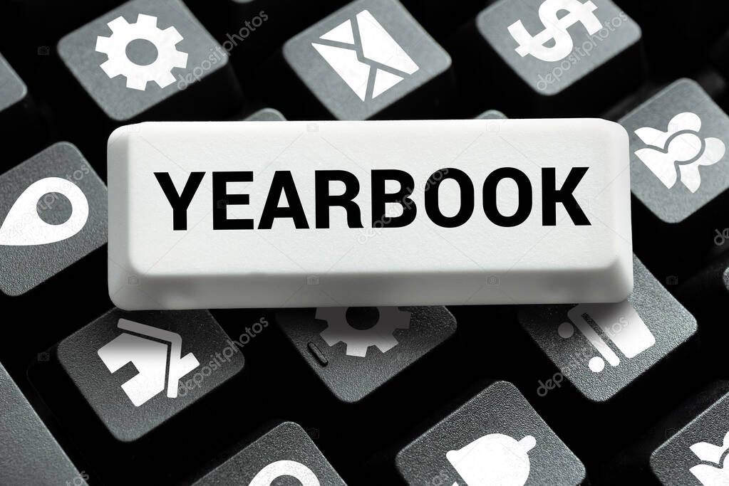 Hand writing sign Yearbook, Word Written on publication compiled by ...