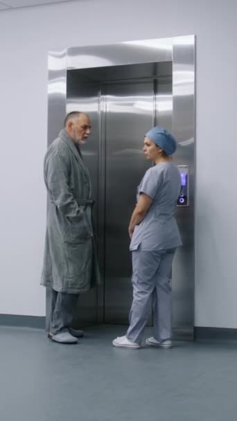 Nurse Elderly Patient Wait Elevator Medical Center Hallway Professional ...