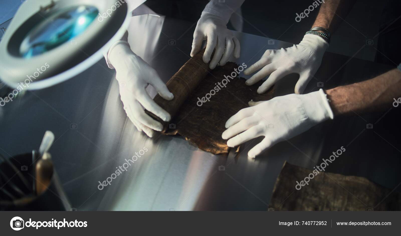 Two Archaeologists Gloves Carefully Roll Out Ancient Egyptian Papyrus ...