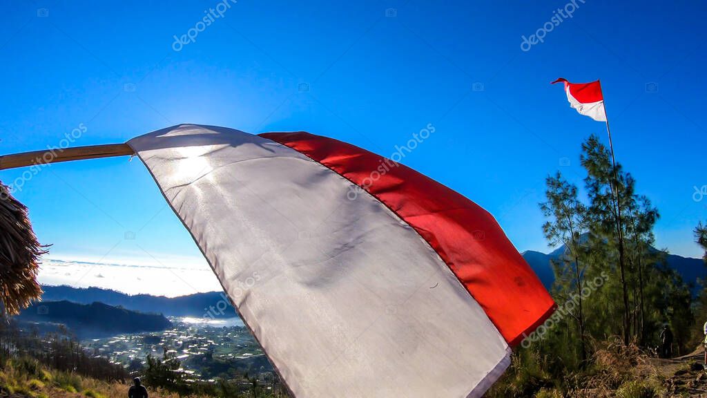 Two Indonesian flags waving with the wind seen from the top of Mount ...
