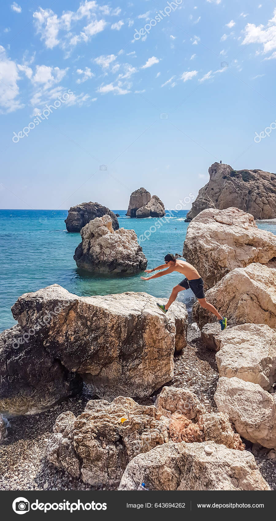 Young Man Jumping Sharp Rocks Aphrodite's Birthplace Petra Tou Romiou ...