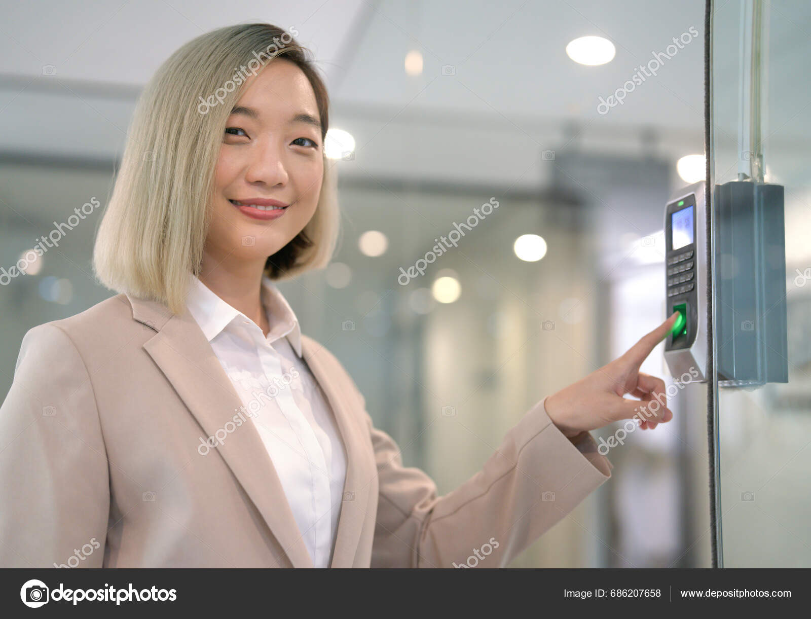 Smiling Young Female Employee Using Index Finger Press Sensor Record ...