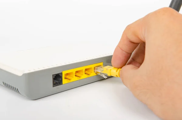 Router and ethernet cable Stockfotografier, royaltyfria Router and ...