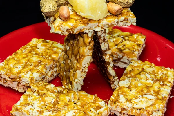 Indian sweet peanut chikki Stock Photos, Royalty Free Indian sweet ...