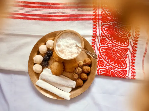 Assamese Traditional Food Items Pitha Laddu Doi Sira Assamese Gamosa ...