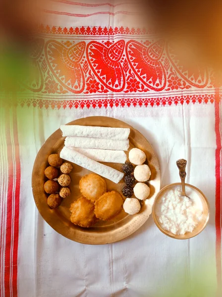 Assamese Traditional Food Items Pitha Laddu Doi Sira Assamese Gamosa ...