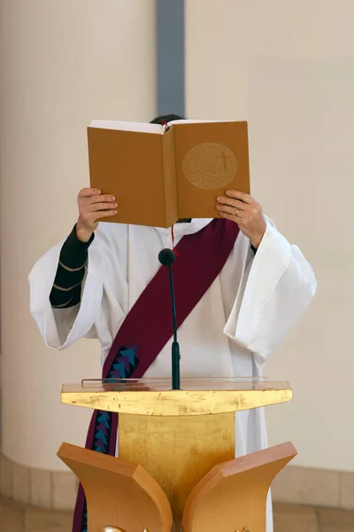 Priest holding the bible Stock Photos, Royalty Free Priest holding the ...