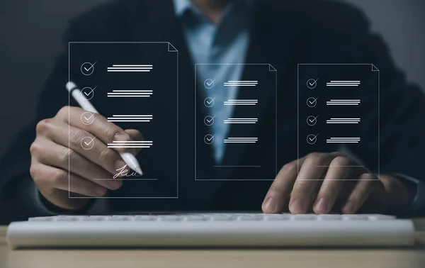 Businessman signing electronic contract on virtual laptop screen via ...