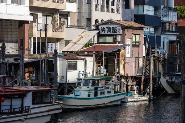 Tokyo, Japan, 1 November 2023: Waterfront Buildings and Boats Along a ...
