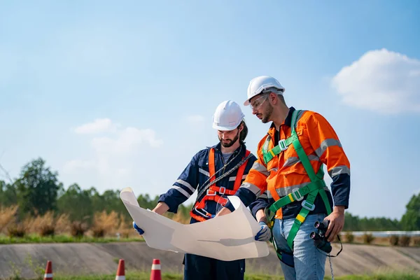 Wind turbine service engineers maintenance and plan for inspection at ...