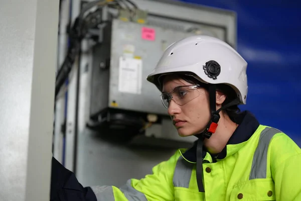 Robotic Arm engineer checking equipment with software of an Artificial ...