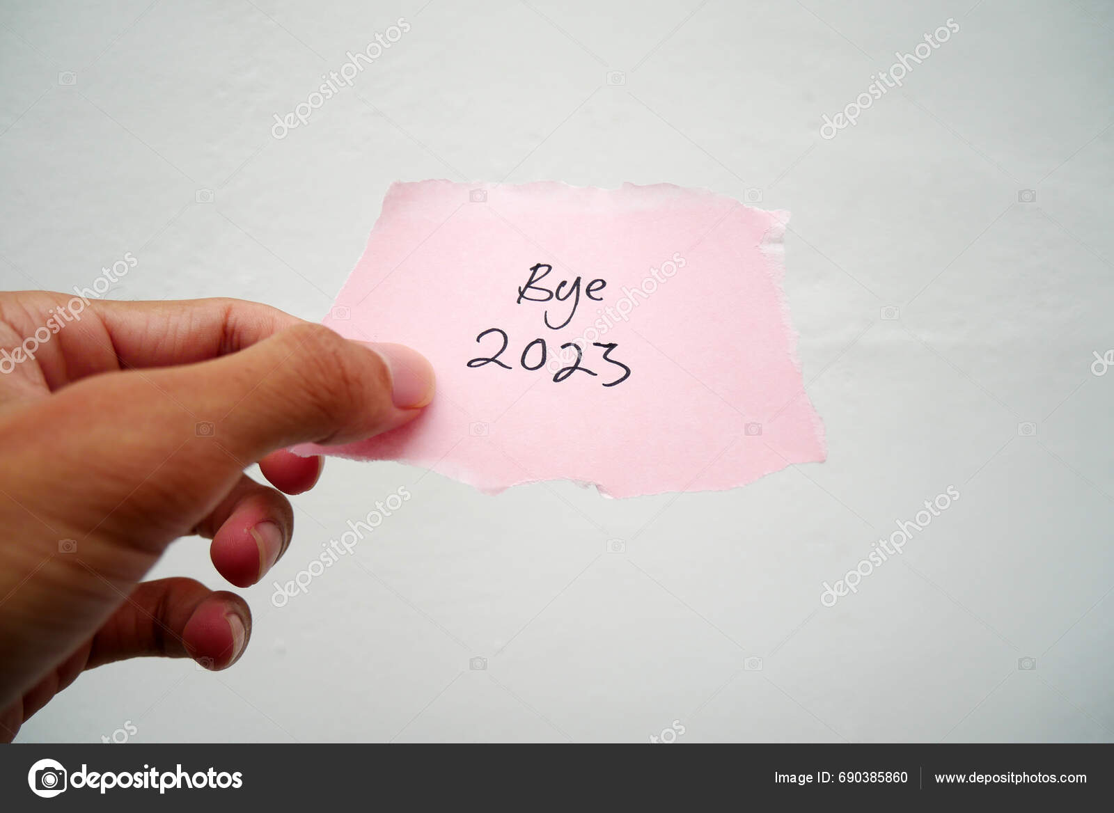 Hand Holding Paper Words Bye Bye 2023 Piece Note Paper Stock Photo by ©buingcorp@gmail.com 690385860