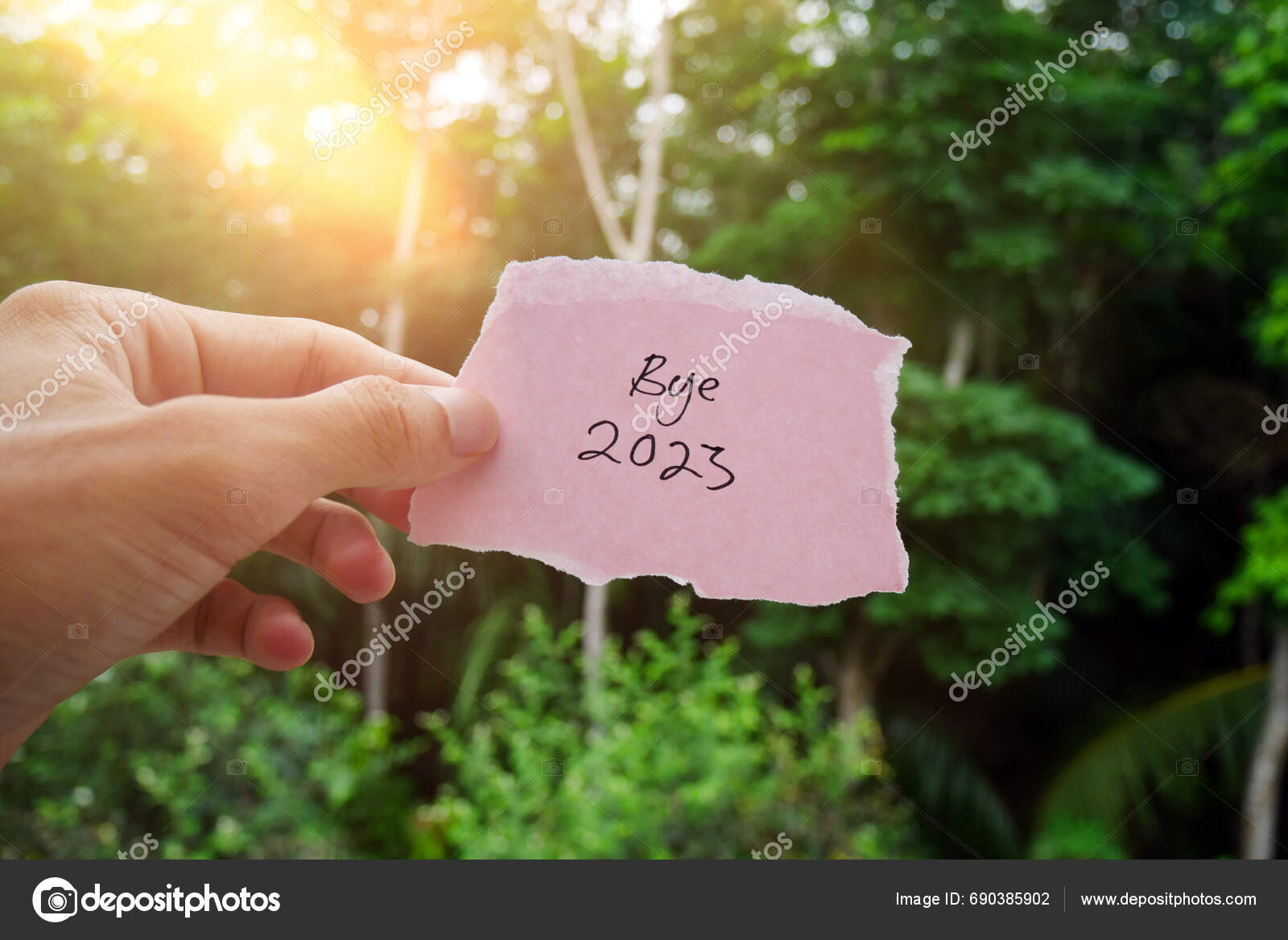Hand Holding Paper Words Bye Bye 2023 Piece Note Paper Stock Photo by ©buingcorp@gmail.com 690385902