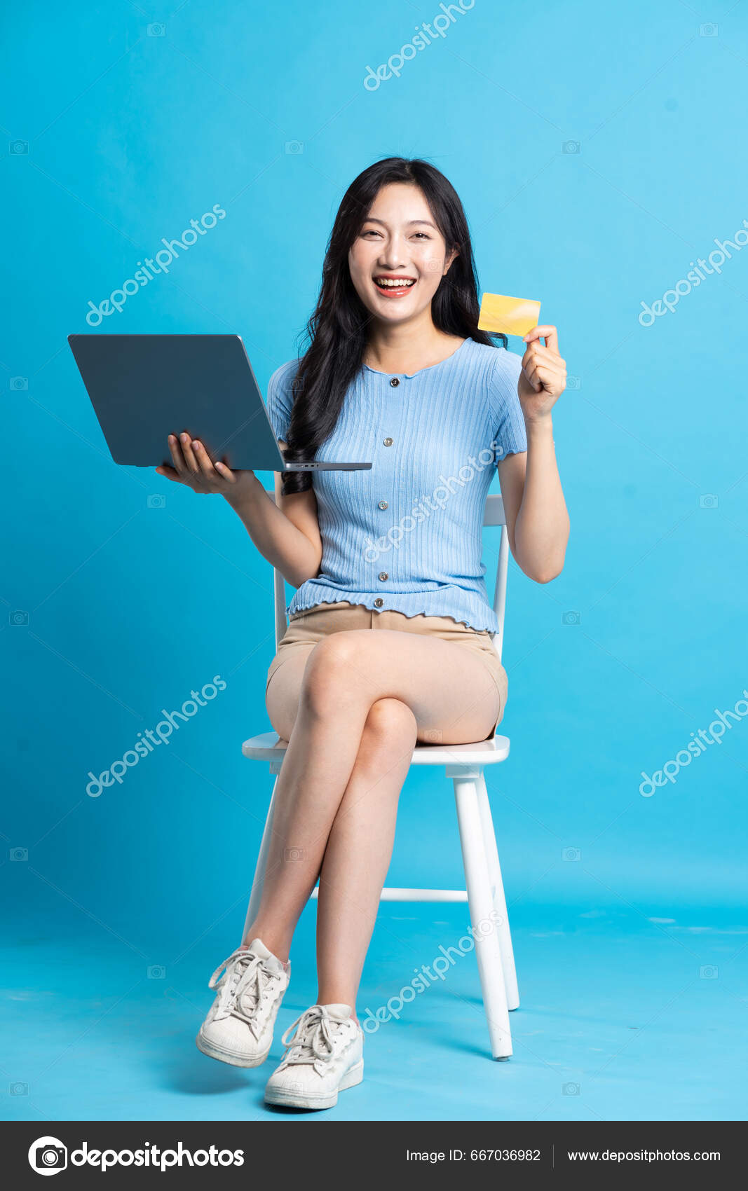 Portrait Smiling Asian Woman Posing Blue Background — Stock Photo © 1112000 #667036982