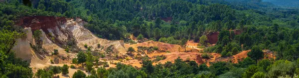 Panoramic view of abstract Rustrel canyon ocher cliffs landscape ...