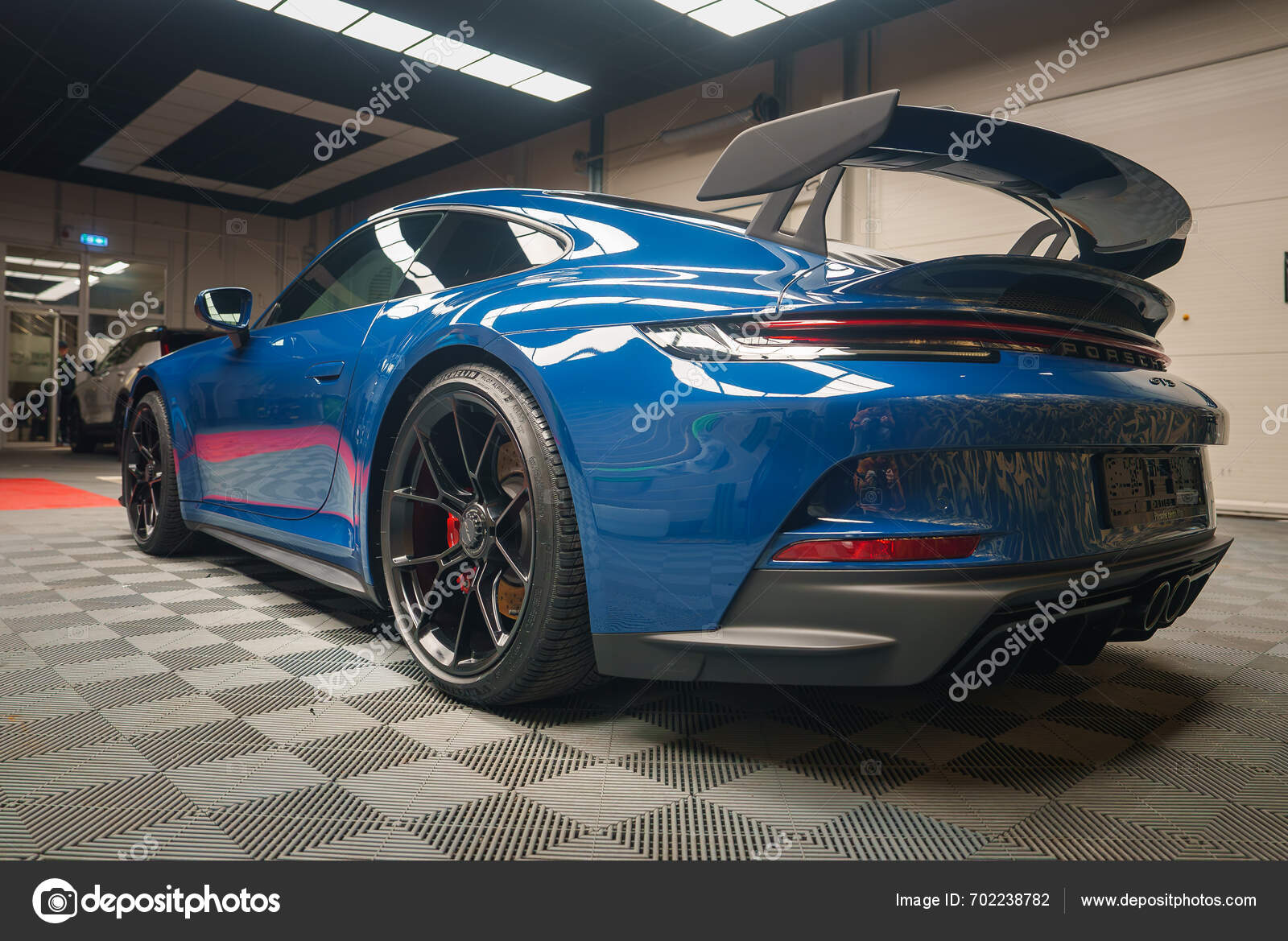 Gleaming Blue Porsche 911 Gt3 Prominent Rear Wing Porsche Lettering ...