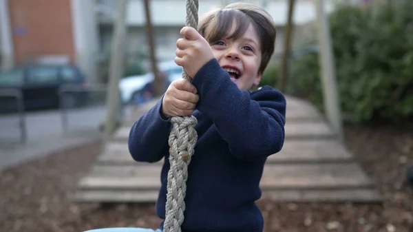 Boy playing on swing Stock Photos, Royalty Free Boy playing on swing ...