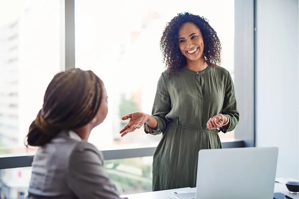 That is great input. a group of businesswomen having a meeting in the ...