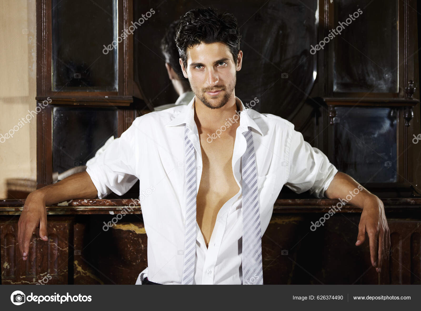 Just Oozes Sexuality Handsome Young Man Leaning Ona Bar Counter Stock ...