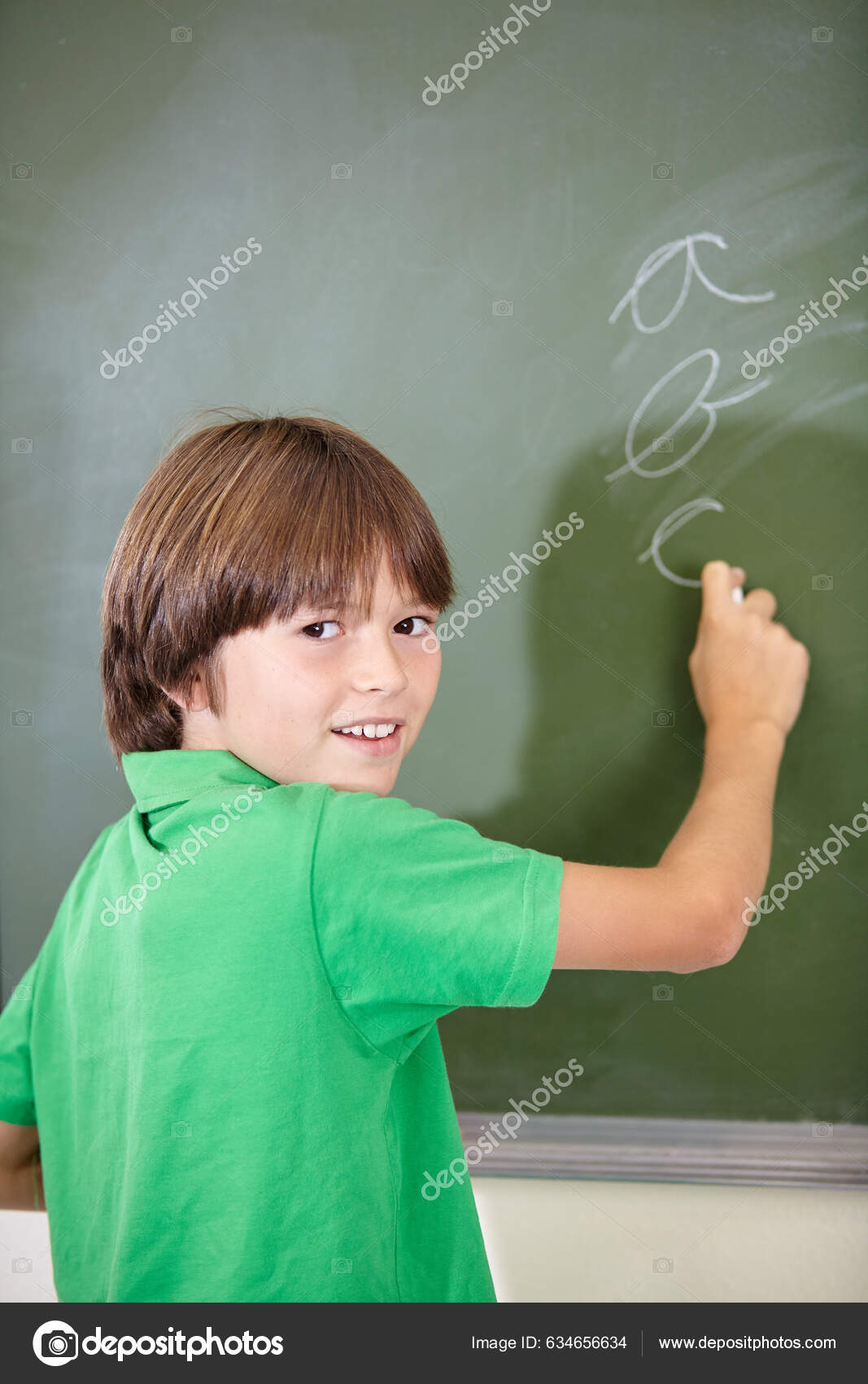Practicing His Cursive Writing Little Boy Writing Blackboard School ...