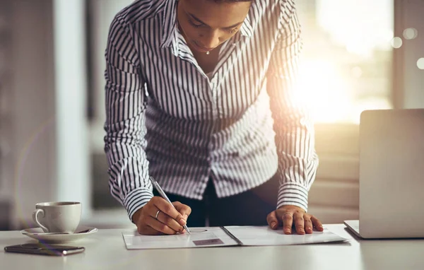 Working hard to keep her lead in the business game. a young ...