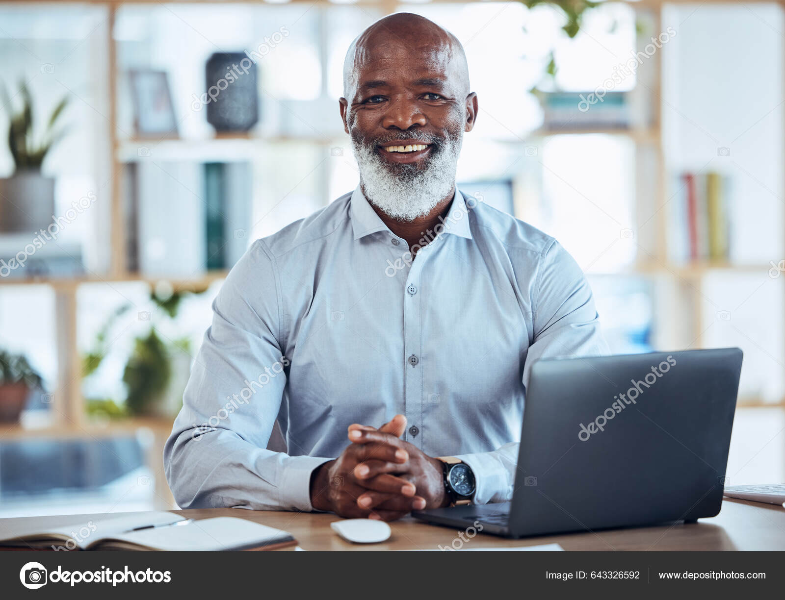 African American Businessman At Desk
