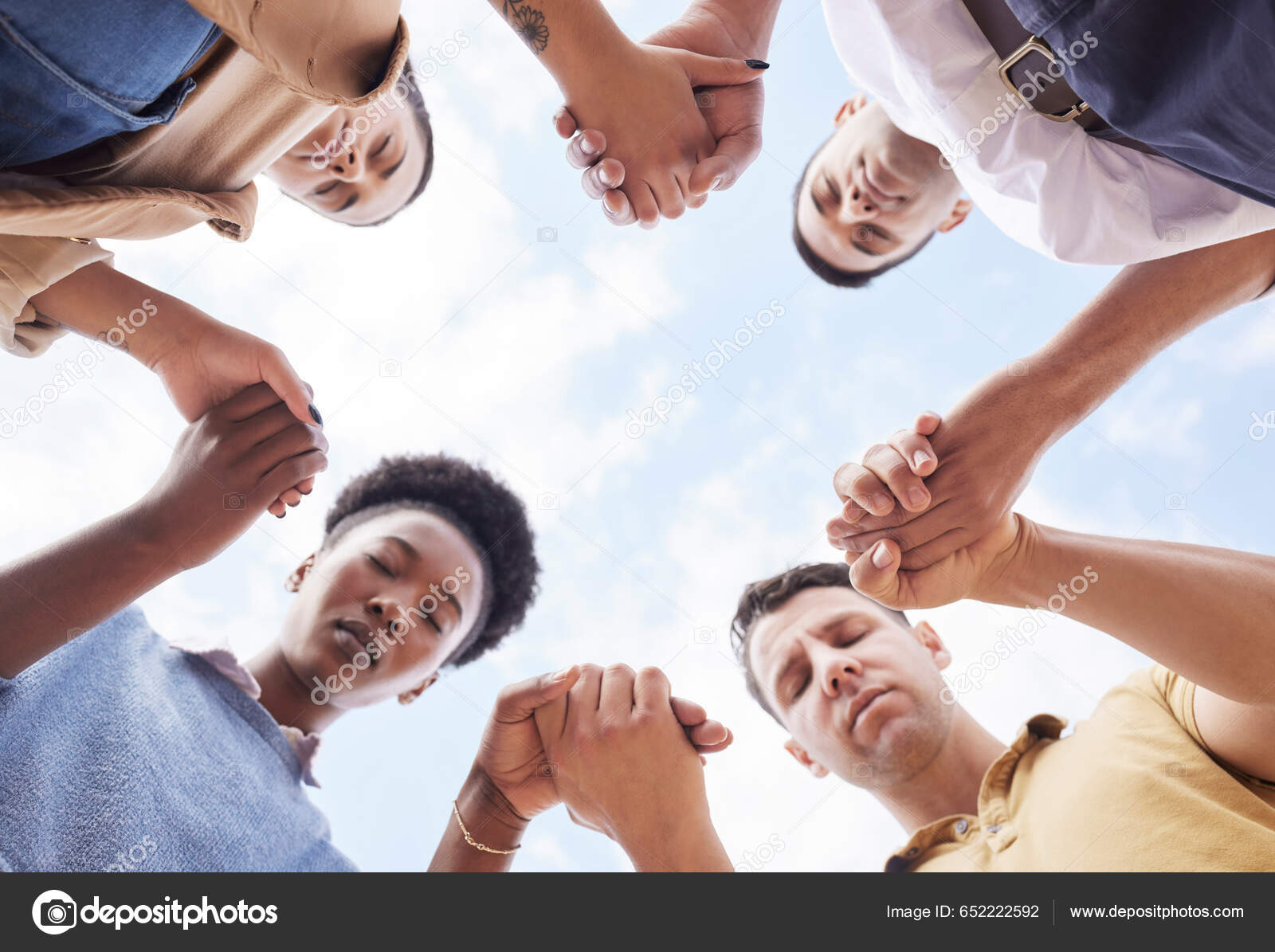 Group Prayer Holding Hands