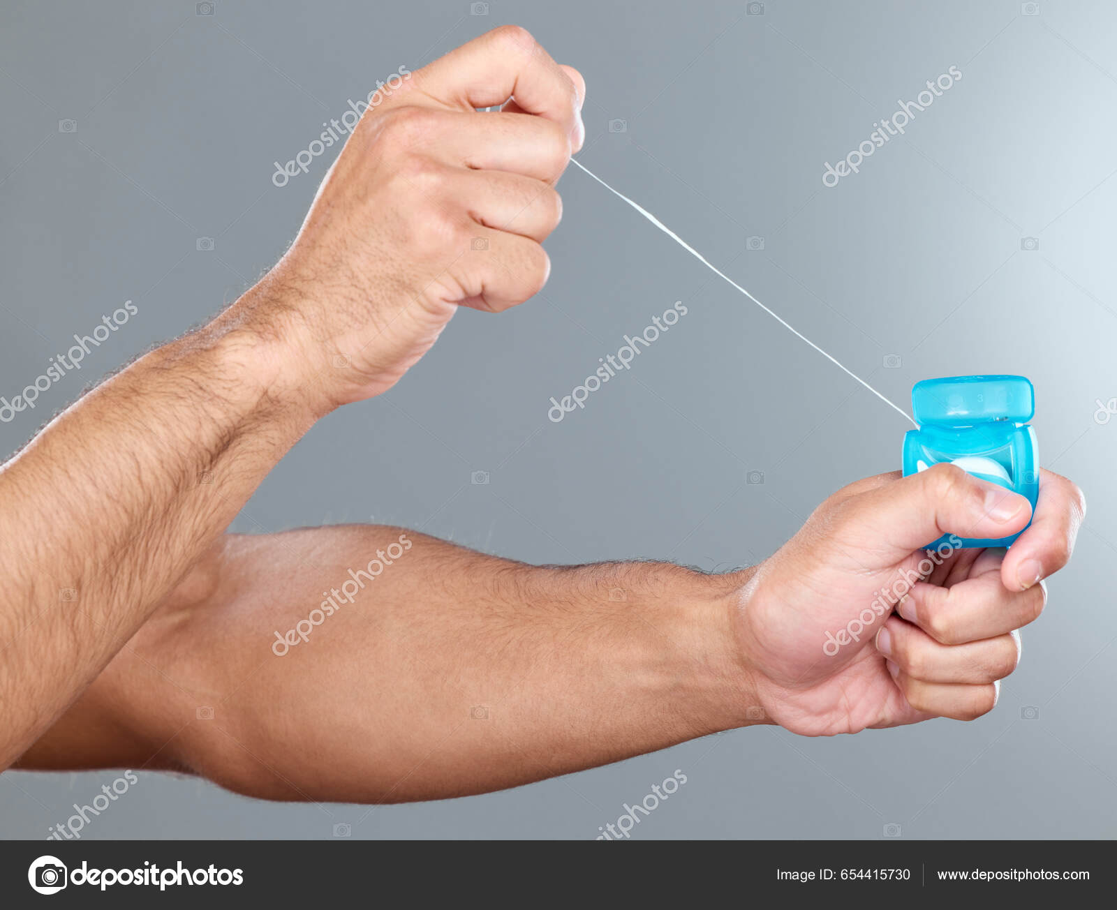 Get Flossing Unrecognizable Man Using Dental Floss Stock Photo by ...