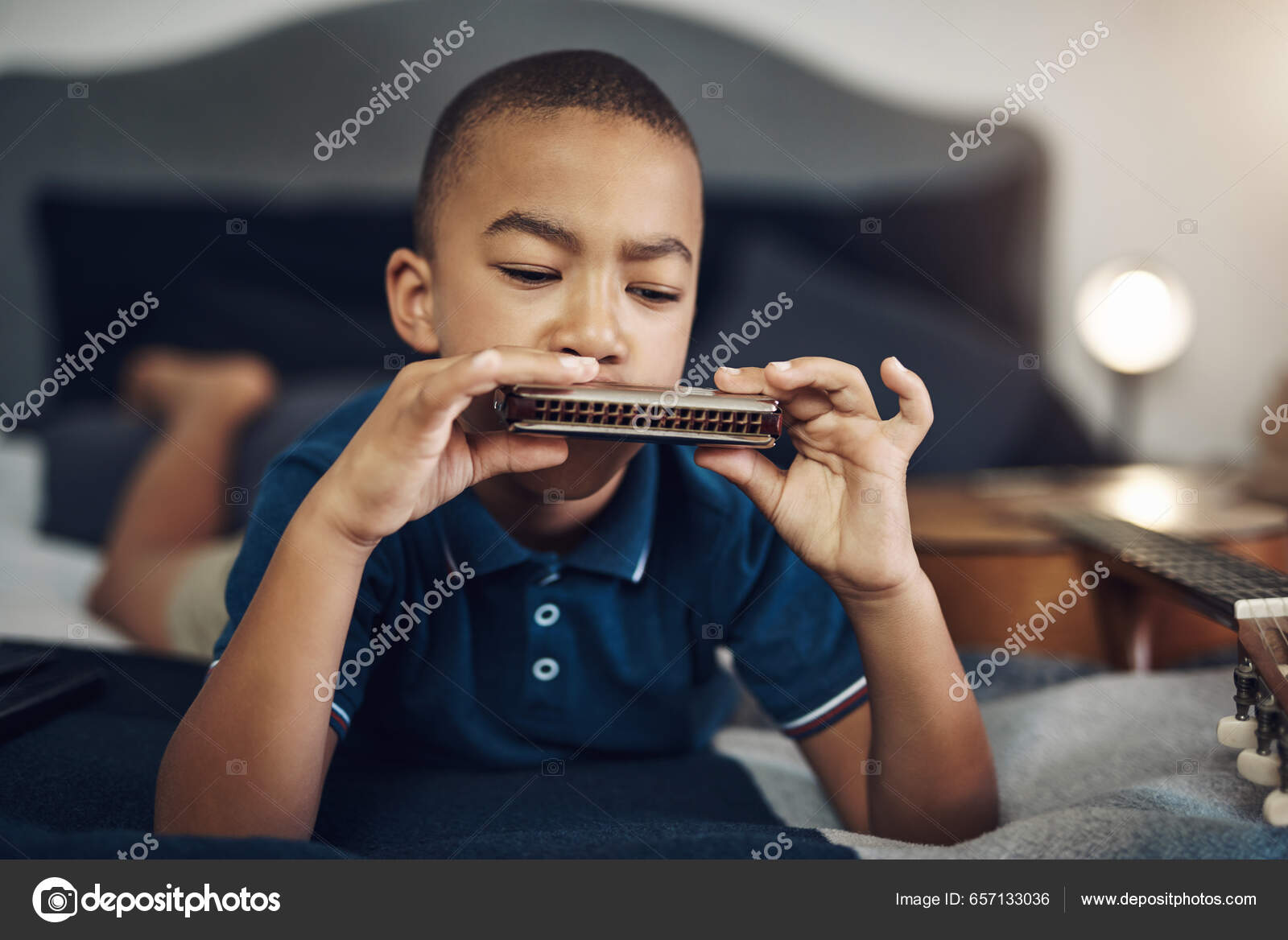 Boy Playing Harmonica