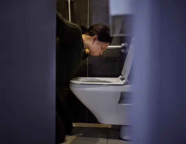 Woman pooping in a sink Stock Photos, Royalty Free Woman pooping in a ...