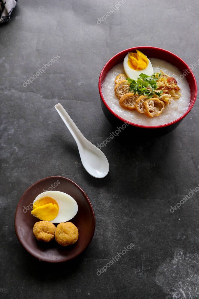 congee porridge with chicken slice, tofu, egg. congee porridge from ...
