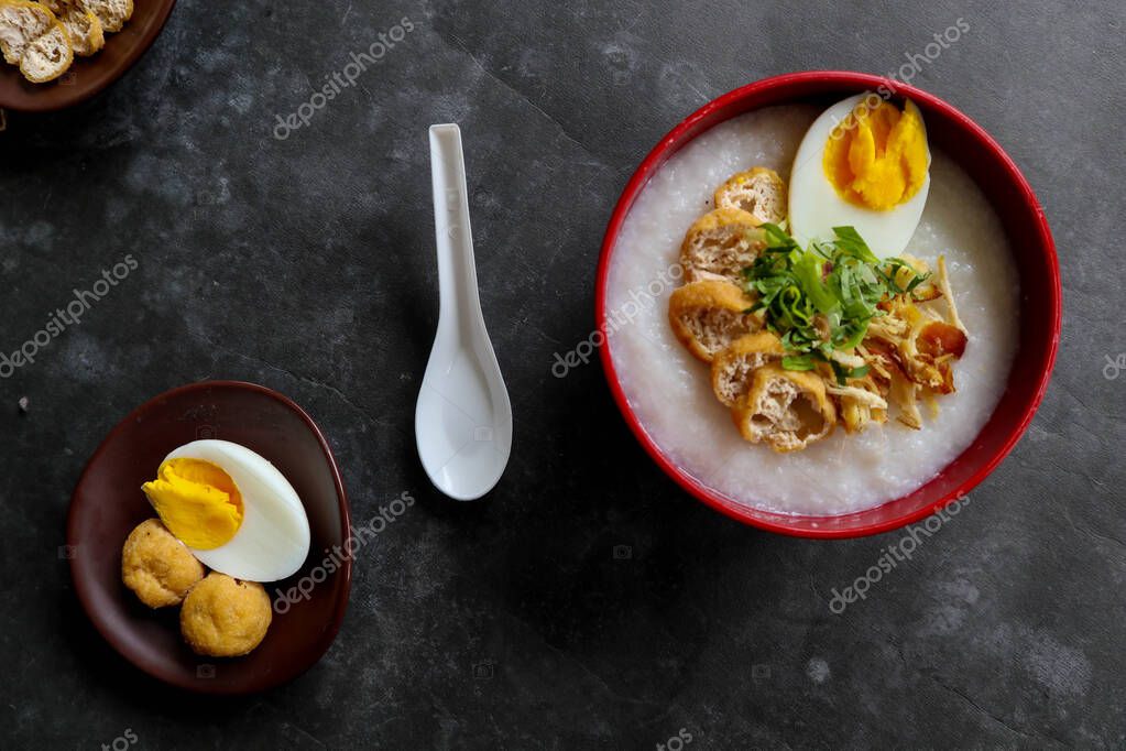 congee porridge with chicken slice, tofu, egg. congee porridge from ...