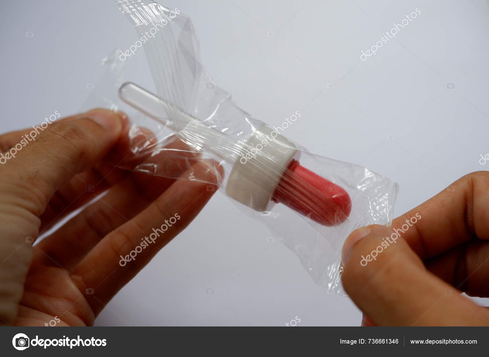 Two Hands Were Tearing Plastic Bag Covering Dropper — Stock Photo ...