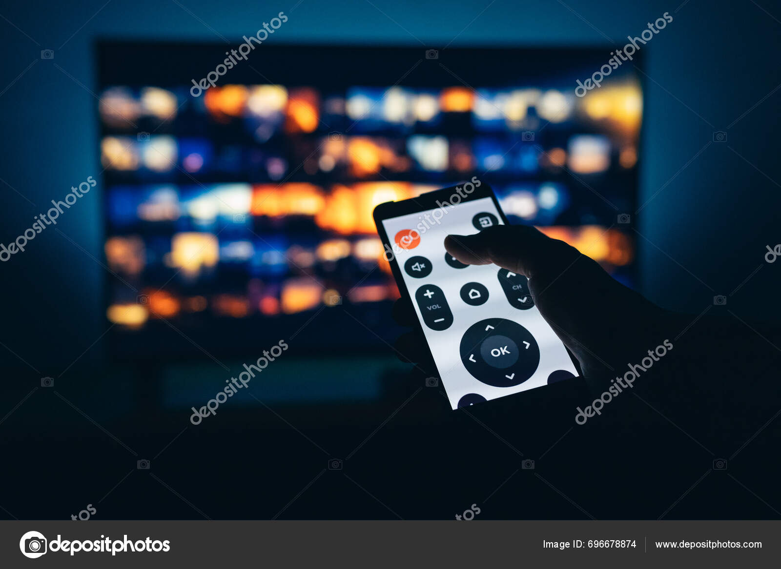 Using Smartphone Remote Control — Stock Photo © francescosgura #696678874